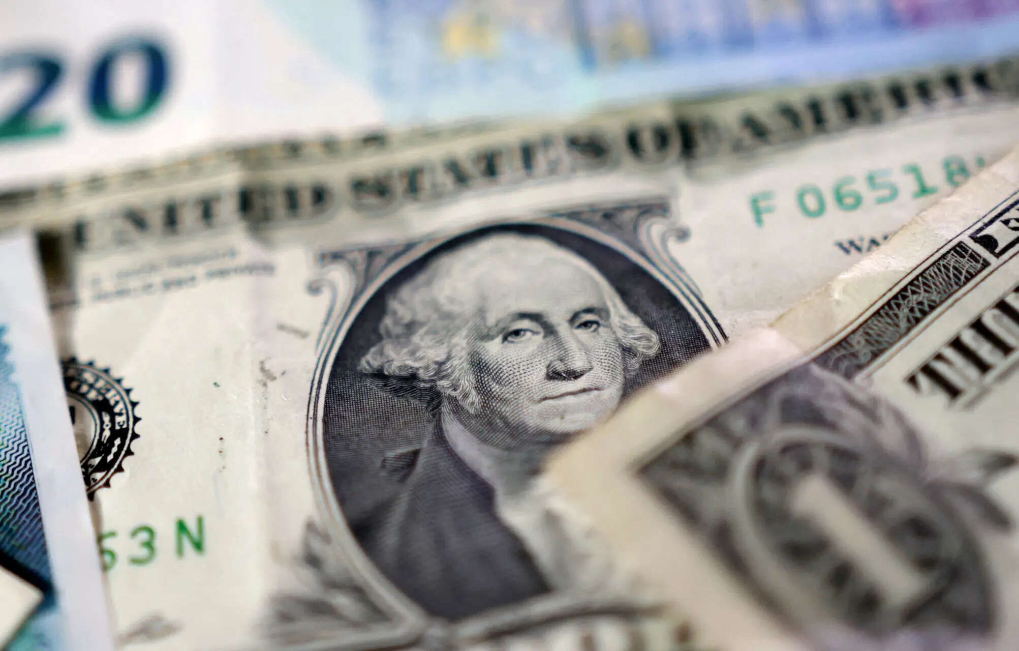 Dollar frail on weak economic data, trade uncertainty lingers