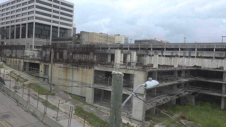 Despite lawsuit threat, developer plans to finish stalled eyesore in ...