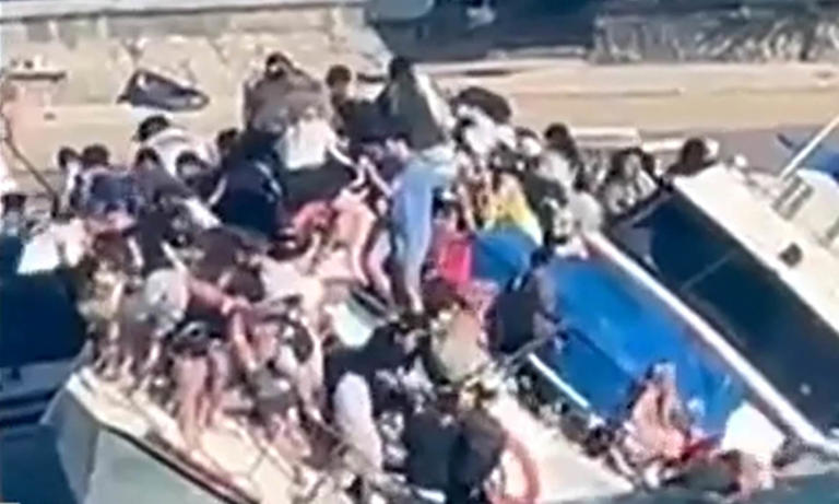 Shocking footage shows the moment a tourist boat capsized in Bali