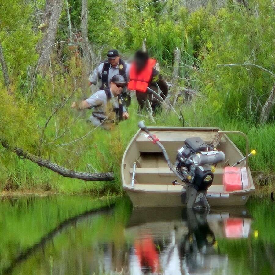Suspect fished out of Cook County pond