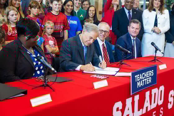Abbott signs bill advancing record funding for public schools, teacher ...