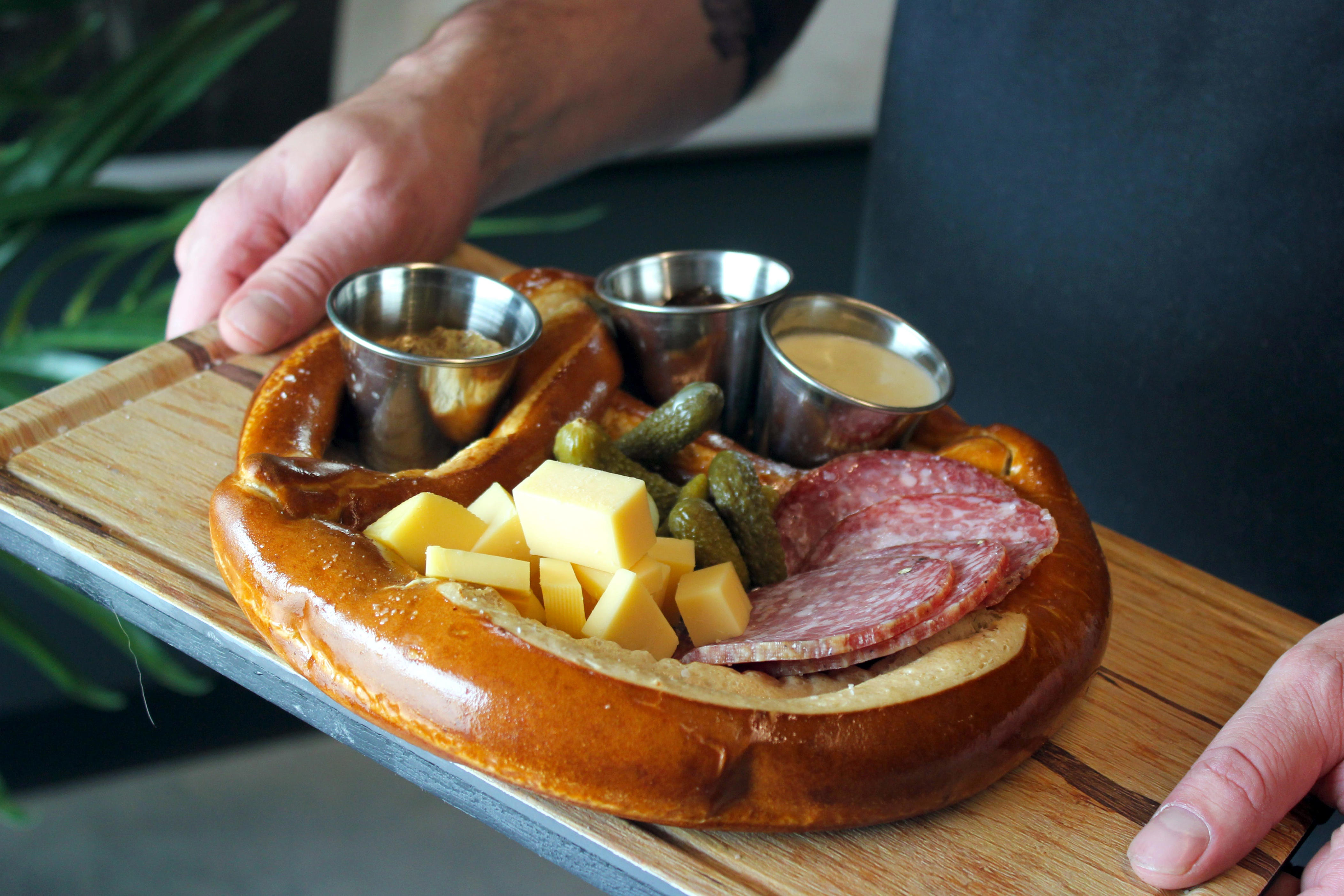 West Side Social brings pickleball, flatbreads, and smashburgers to Pella