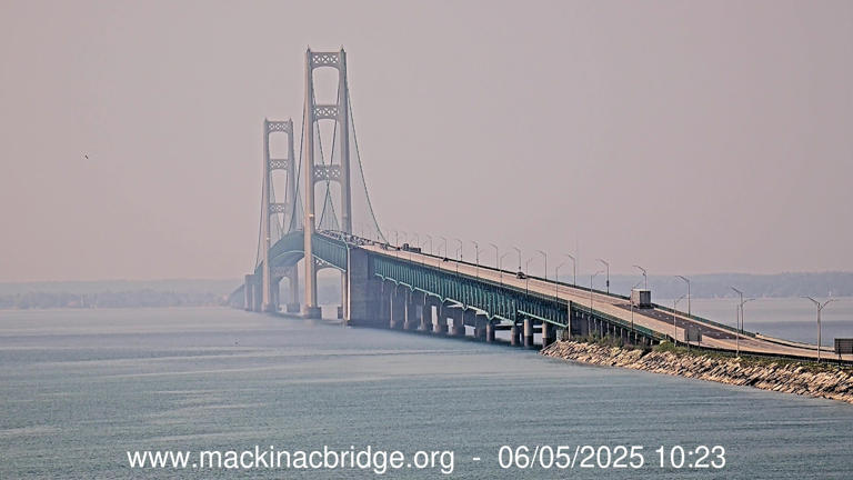 Canadian wildfire smoke engulfs Michigan's Mackinac Bridge, causing it ...