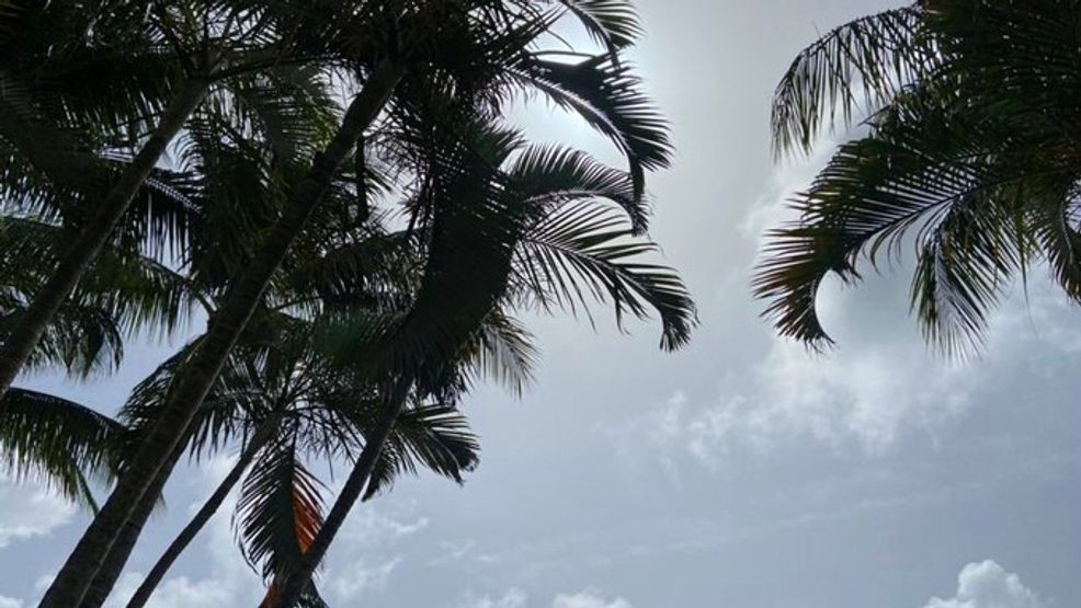 Staying hot and mainly dry through the weekend