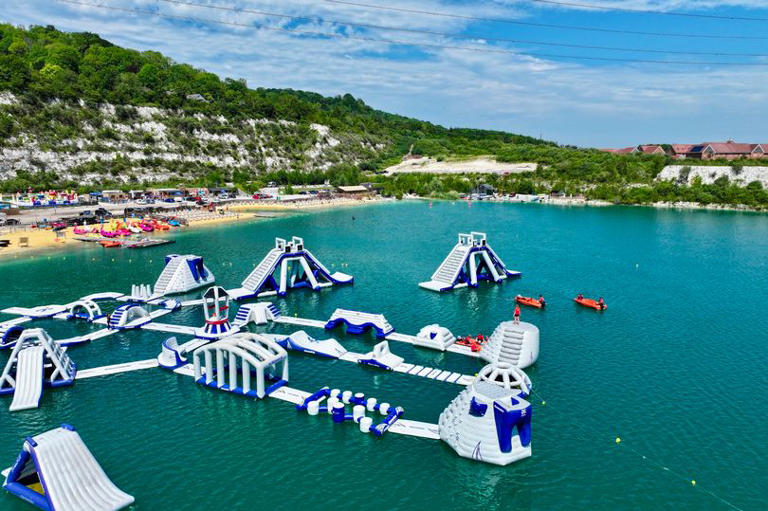The Kent village with a stunning turquoise lake that looks like the ...