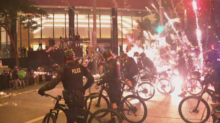 Seattle police arrest 8, deploy crowd control tactics during anti-ICE ...