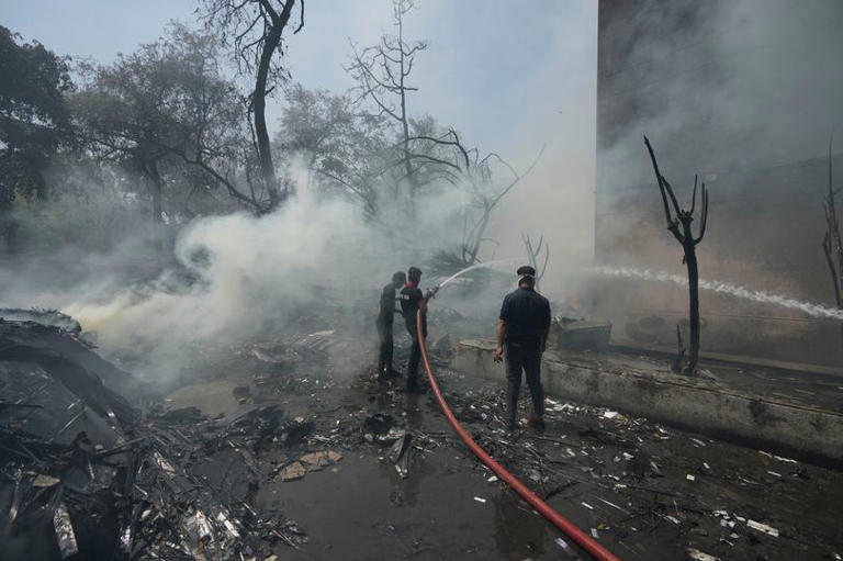 India plane crash leaves 'no survivors' as 242 dead after take-off fireball