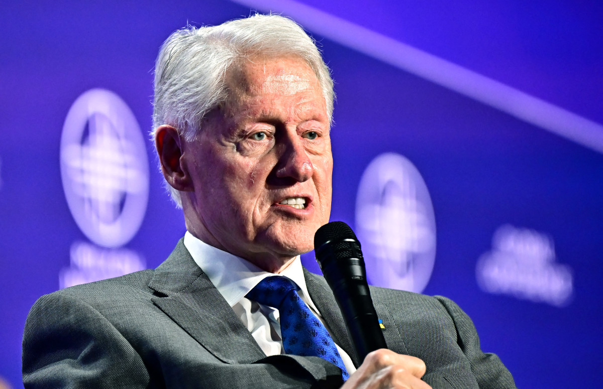 Bill Clinton Poses with Legendary Author During Rare Public Outing in NYC