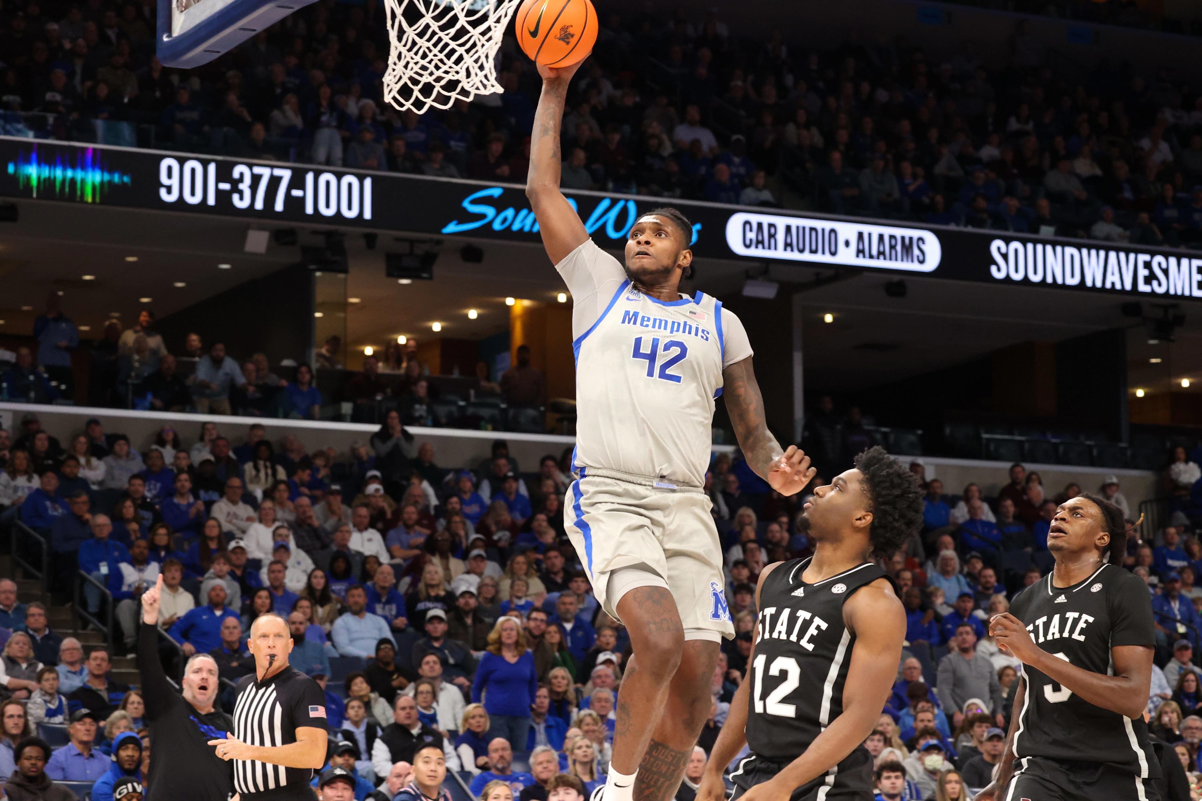 Memphis' Dain Dainja, as he awaits an NCAA eligibility ruling, works ...