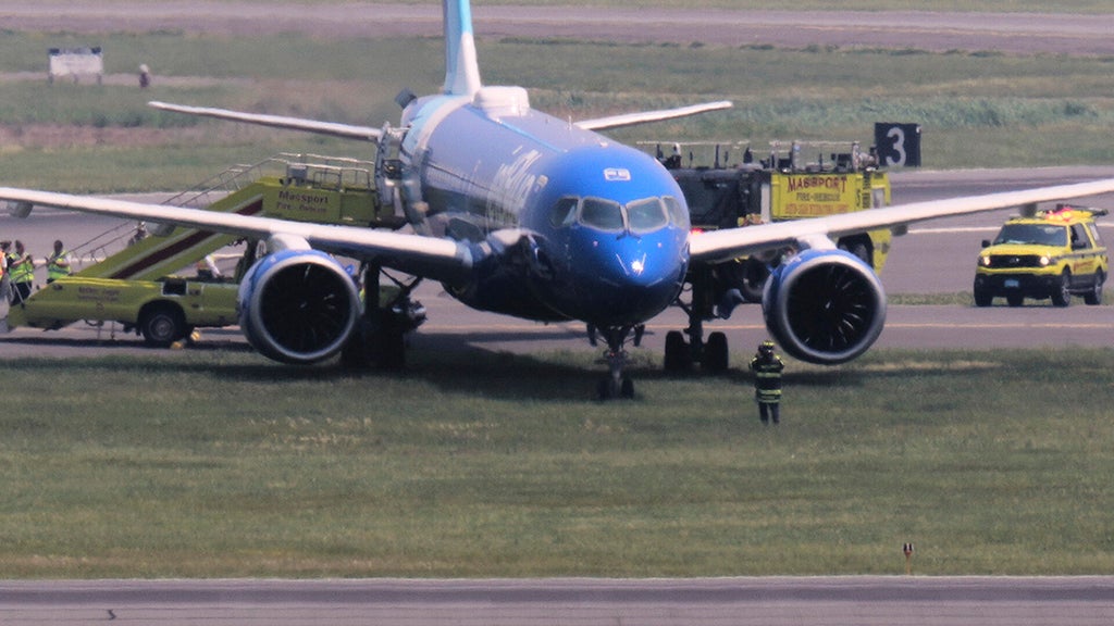 JetBlue flight rolls off runway at Boston's Logan Airport upon arrival ...