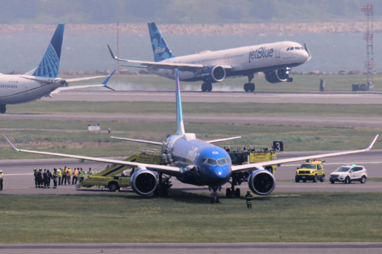 JetBlue plane rolls off runway after landing at Boston Logan Airport