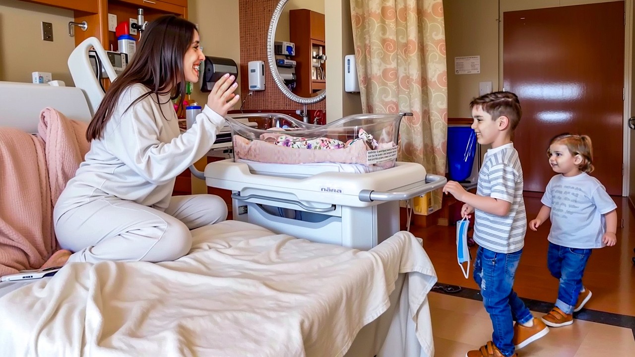 These brothers meet their baby sister for the first time