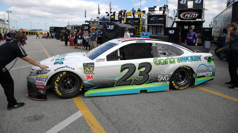 Former NASCAR team owner pleads guilty in federal court