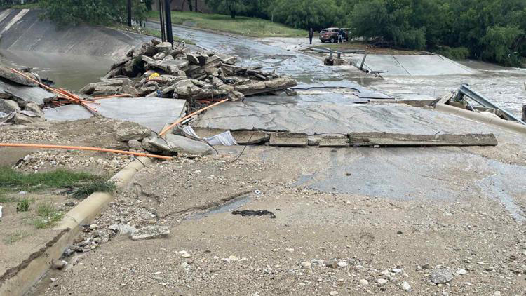 Giant chunks of concrete broken free by raging flood water, destroying ...