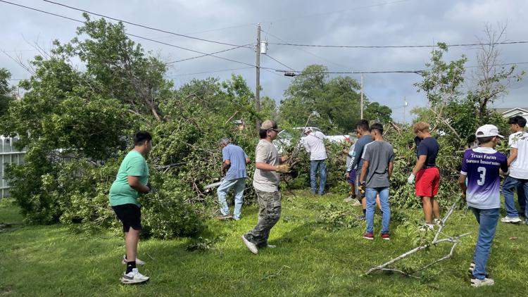 PHOTOS: Sabinal HS athletes step up, help clean up after storms