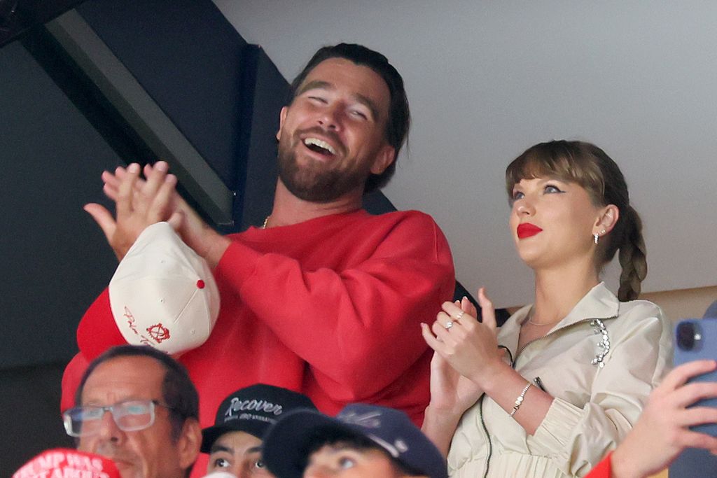 Taylor Swift leads sing-a-long to her own song with NFL players - watch