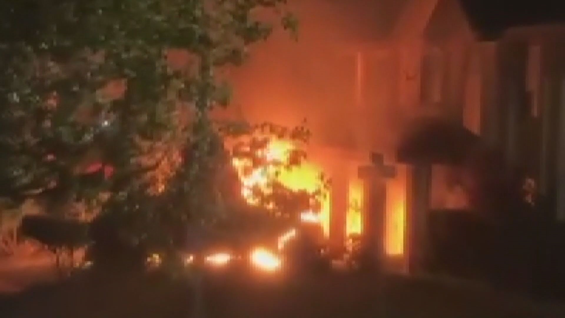 Officers recount rescue of people from burning home