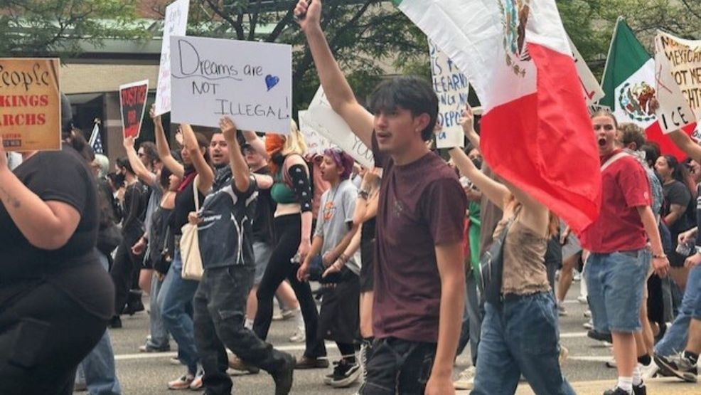 Hundreds march through downtown Salt Lake to protest against ICE raids ...