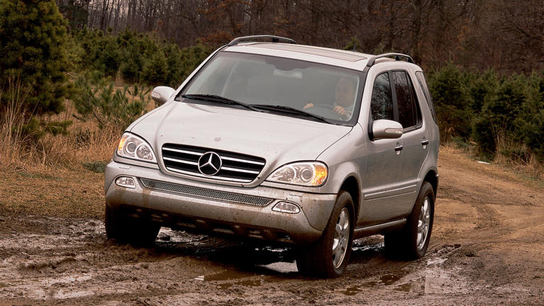 Archive Drive: 2002 Cadillac Escalade vs. 2003 Lincoln Navigator vs ...