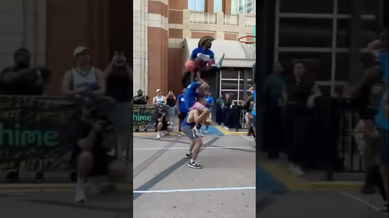 kingdac: crazy basketball dunk: man leaps off shoulders for amazing shot!