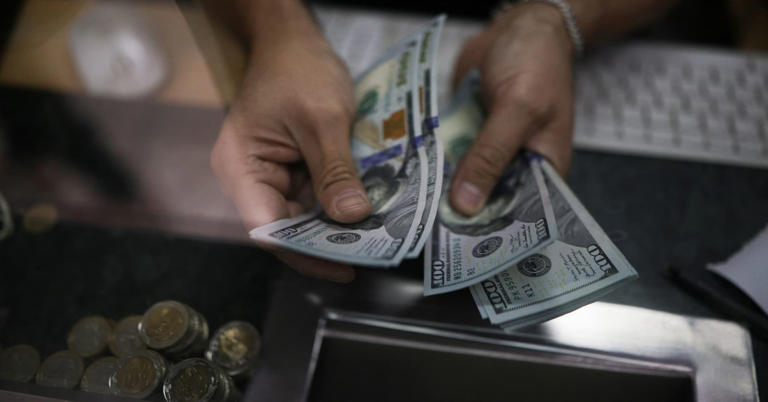Dollar rallies amid safe-haven rush after Israel strikes Iran