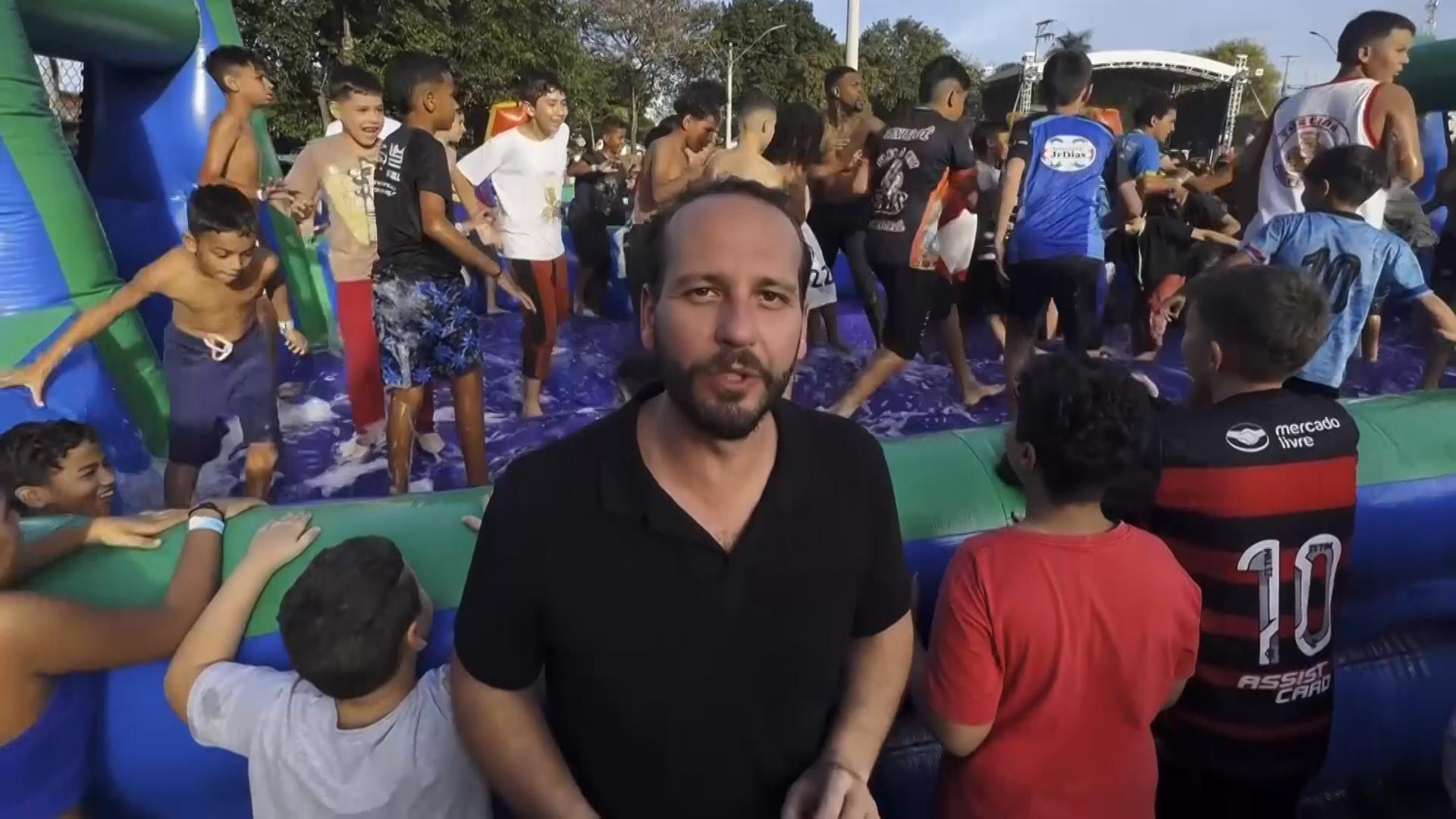 Kids in Brazil delighted as famous Tiktoker turns up for a kickabout