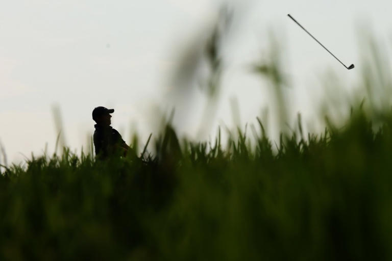 Rory McIlroy barely squeaks into US Open weekend despite club-smashing ...