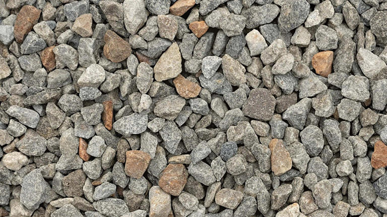 The Easiest Way To Stop Weeds From Growing In Gravel Before They Start