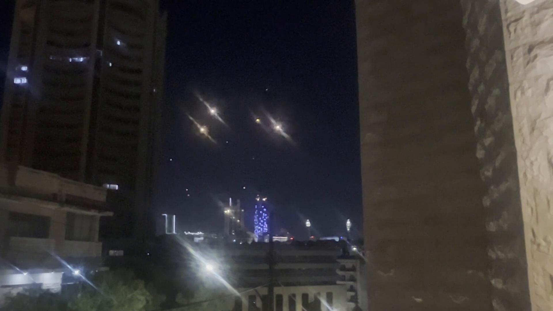 Iranian missiles seen being intercepted in the sky above Amman
