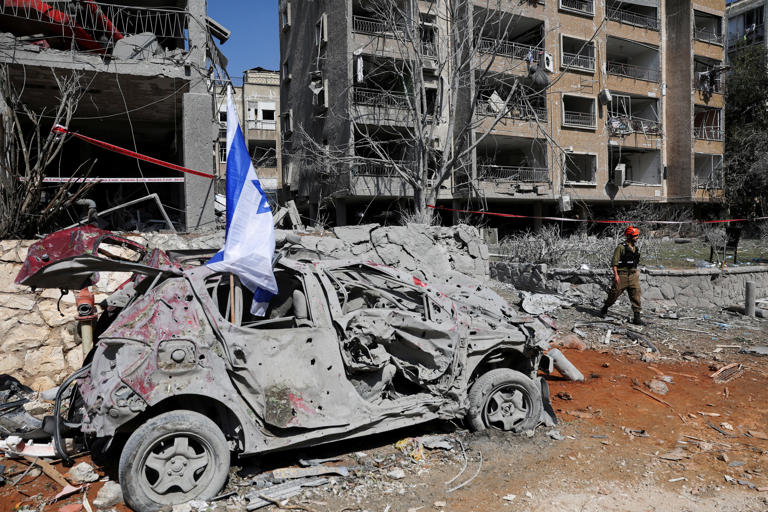 Israel threatens 'Tehran will burn' after Iran revenge strikes