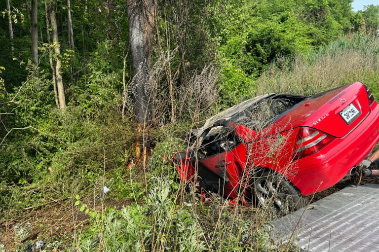 PHOTOS: Car bursts into flames after crash in Haddam