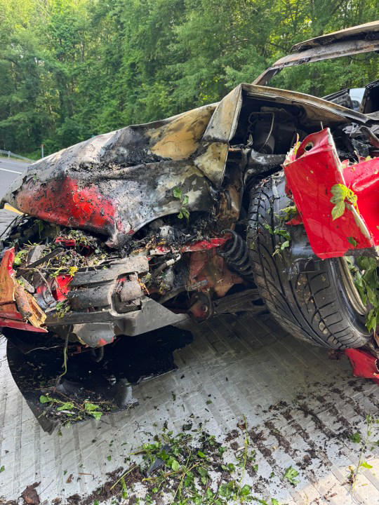 PHOTOS: Car bursts into flames after crash in Haddam