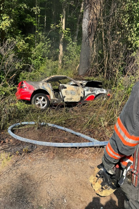 PHOTOS: Car bursts into flames after crash in Haddam
