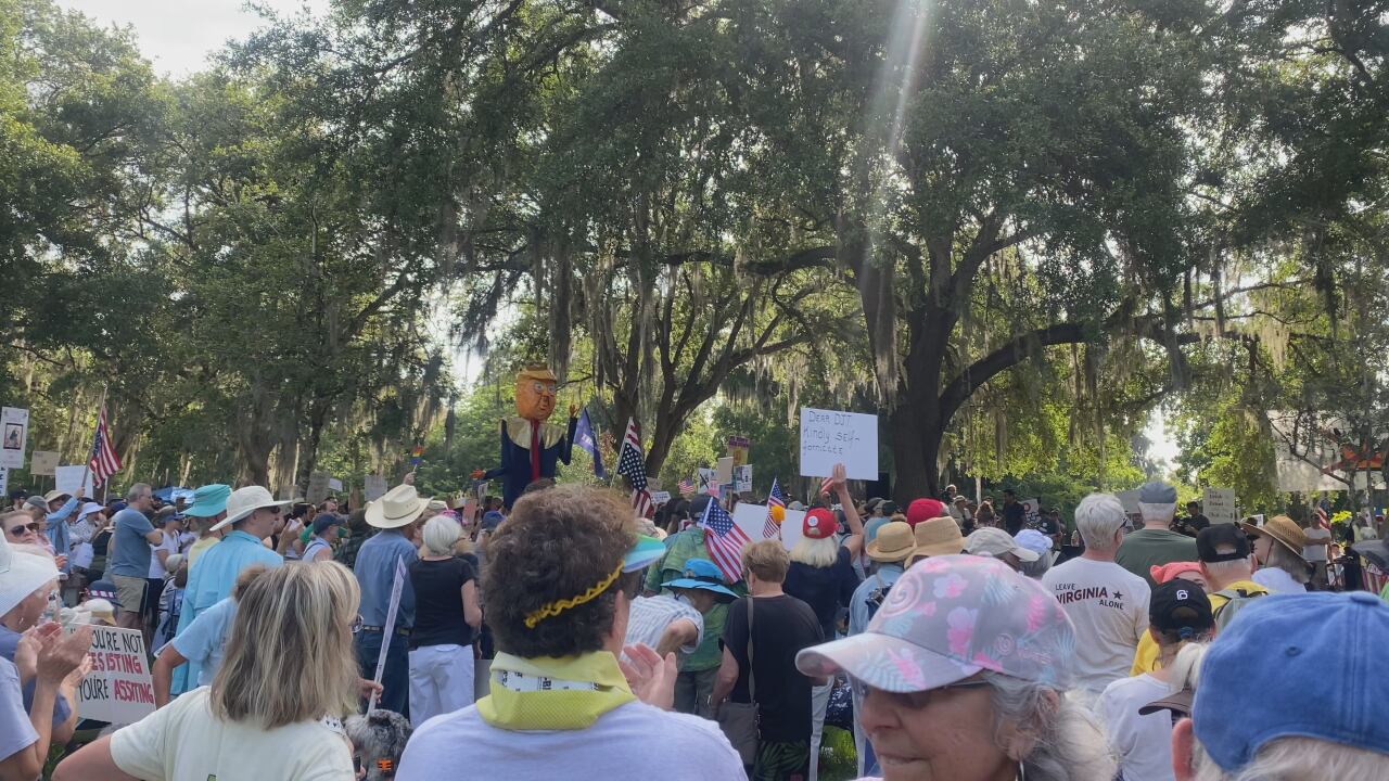 People in North Central Florida protest President Donald Trump during ...