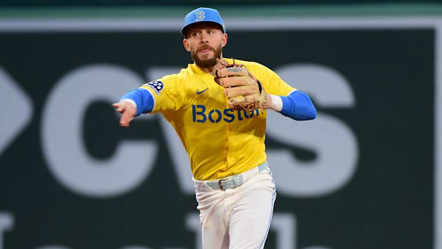 Why are the Boston Red Sox wearing yellow jerseys?
