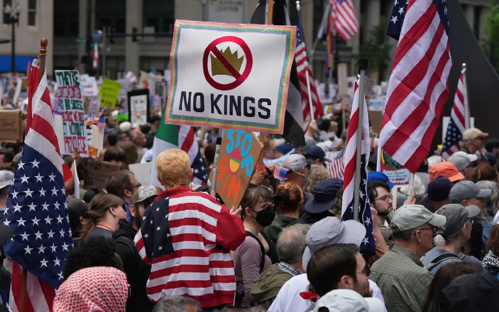 Tens of thousands of Americans rally ahead of Trump’s military parade
