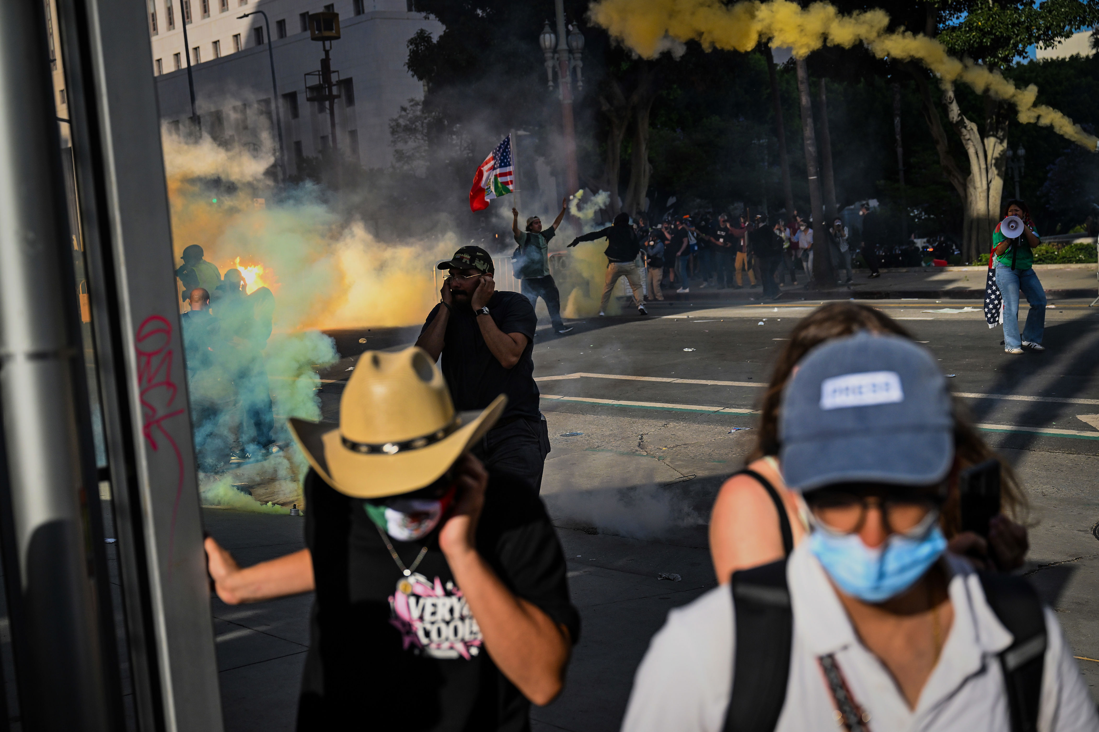 Police deploy stun grenades, rubber bullets, tear gas on L.A. protesters