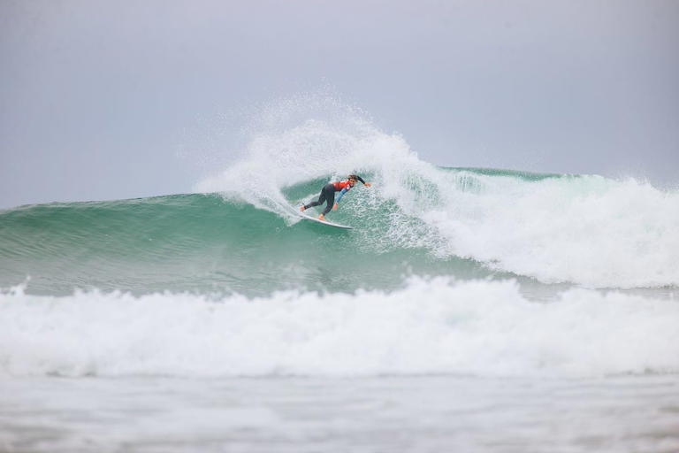 Kelly Slater, Caroline Marks fall at Lower Trestles; Marks throws out ...