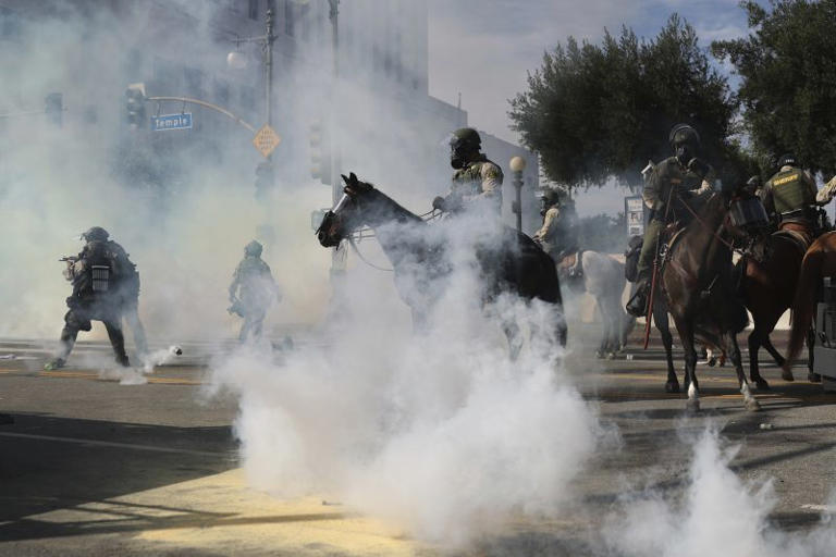 Officers deploy tear gas, rubber bullets to clear protesters in ...