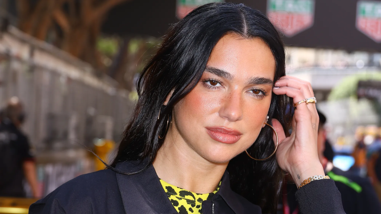Dua Lipa’s ‘tension set’ engagement ring with a cigar band is the most ...