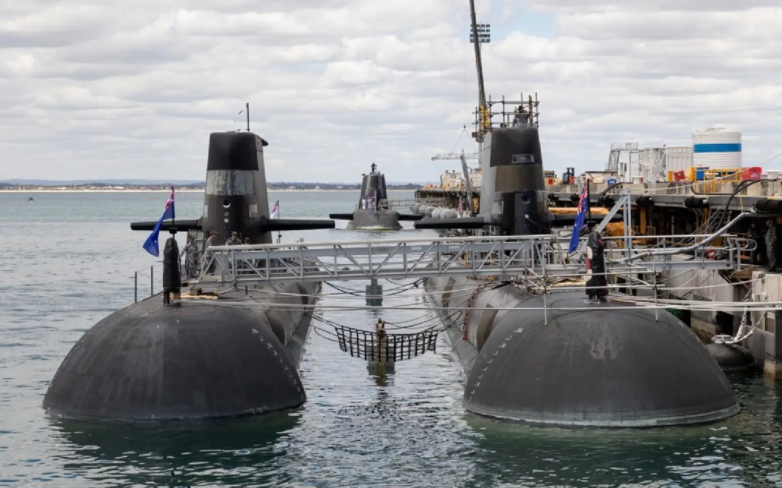 UK, Australia back embattled submarine deal with US