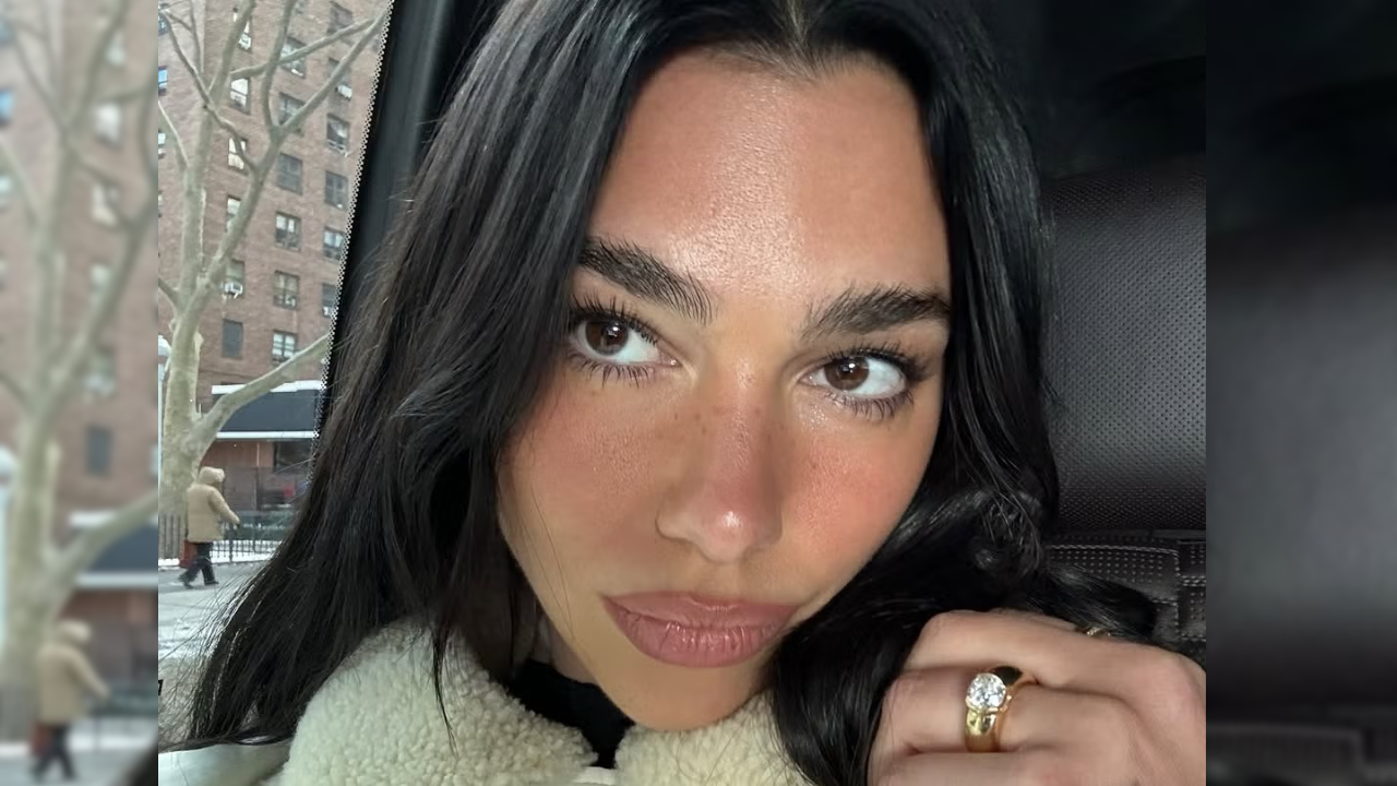 Dua Lipa’s ‘tension set’ engagement ring with a cigar band is the most ...