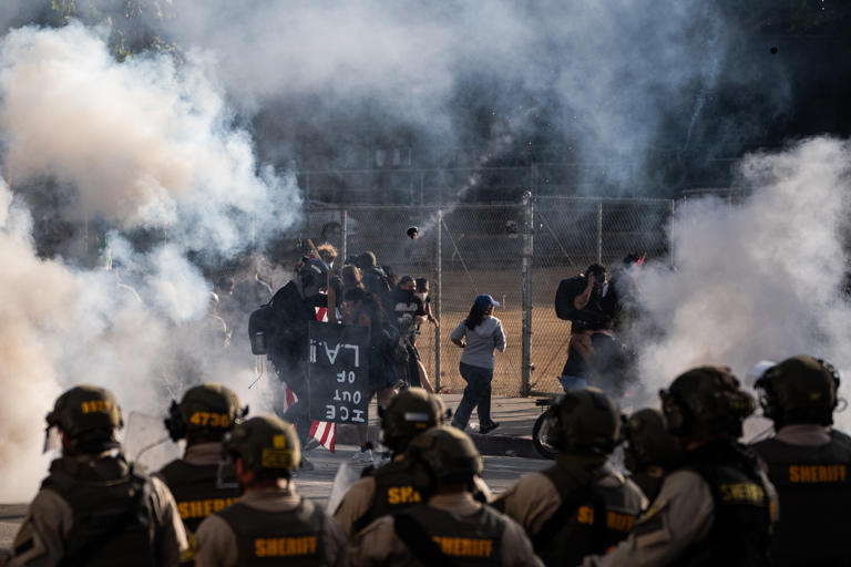 Police deploy stun grenades, rubber bullets, tear gas on L.A. protesters