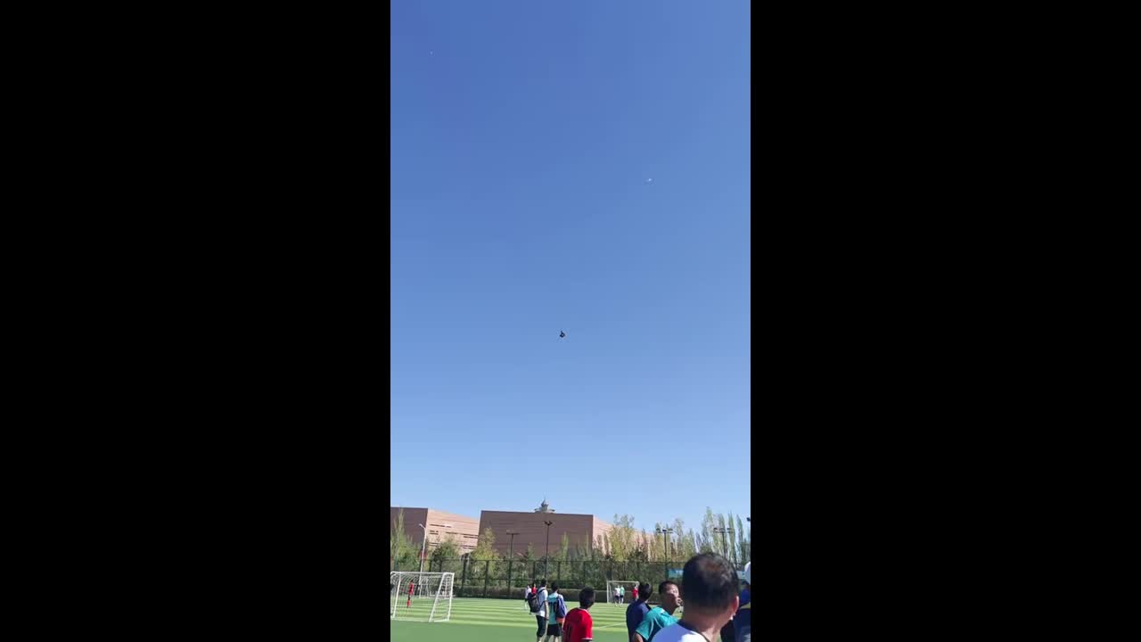 Pants fall from the sky during football game in Shaanxi, China