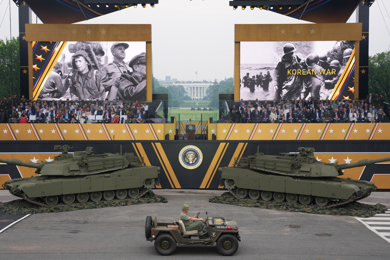 Trump's birthday military parade in pictures: Soldiers march and tanks ...