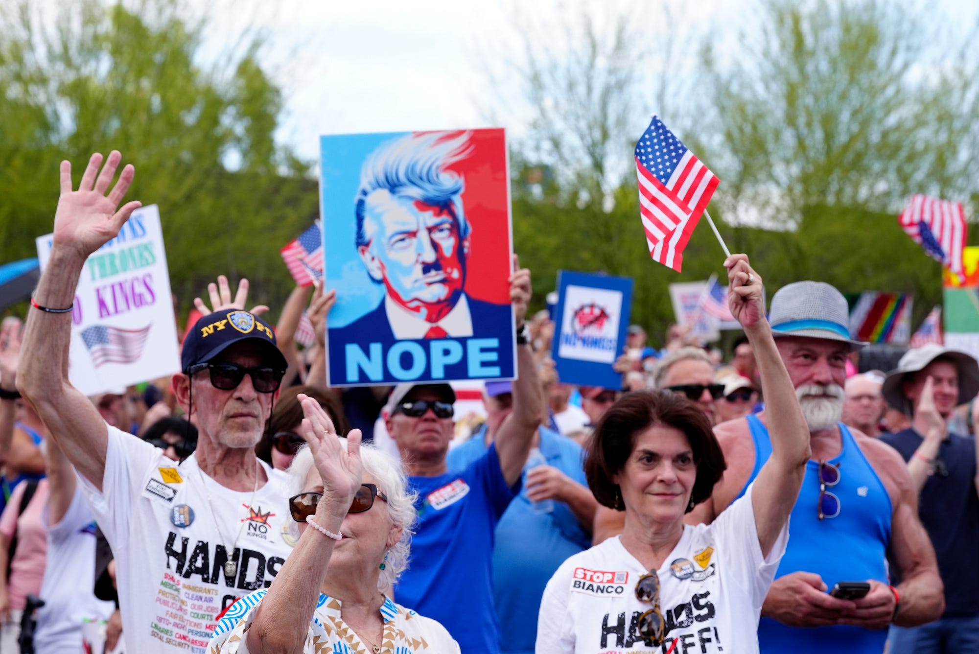 'No Kings in America;' Coachella Valley residents demonstrate against ...