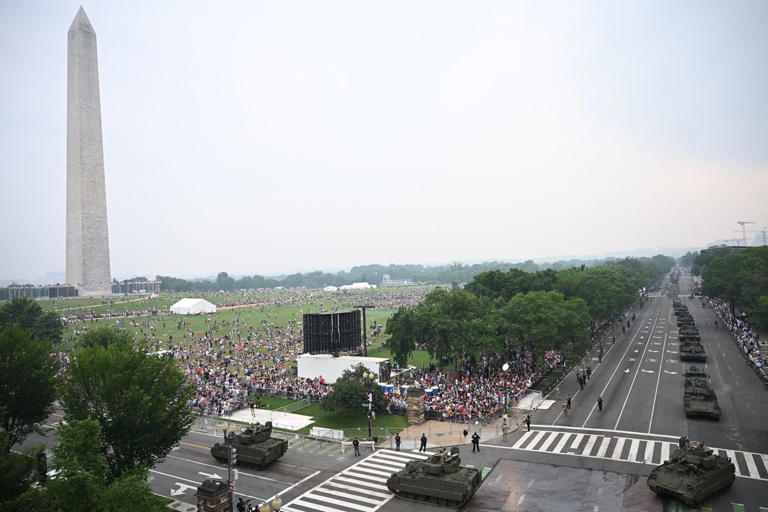 Trump's birthday military parade in pictures: Soldiers march and tanks ...