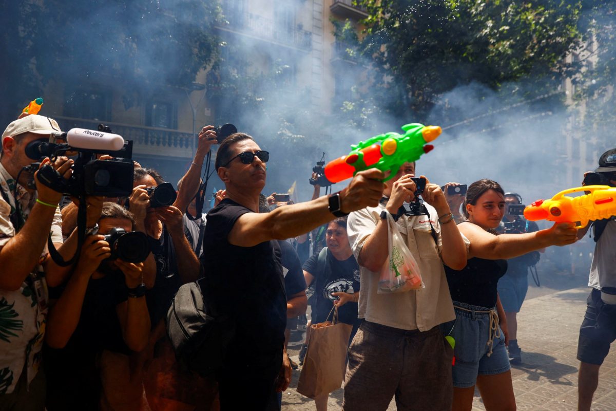 Activists blockade Barcelona hotel as anti-tourism protests sweep Europe