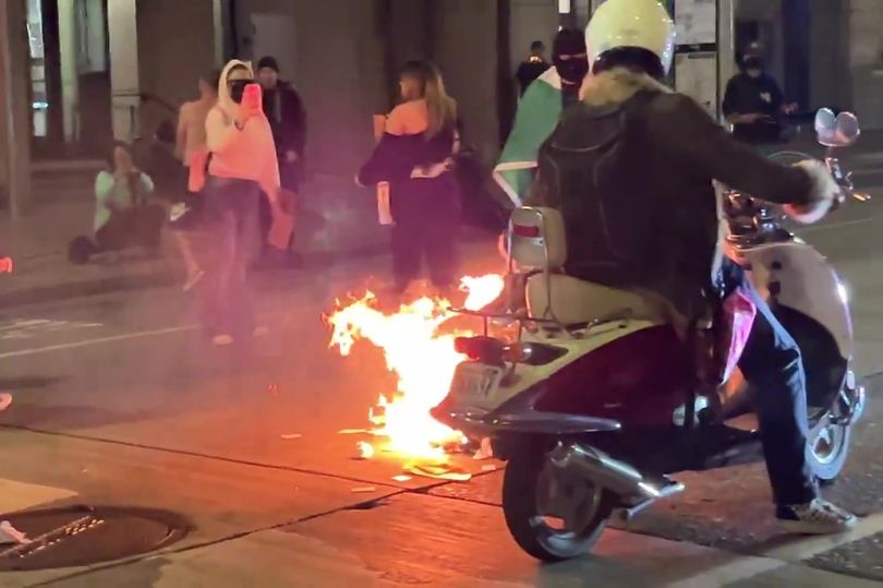 Seattle riots: Protestors blast fireworks and clash with cops as images ...