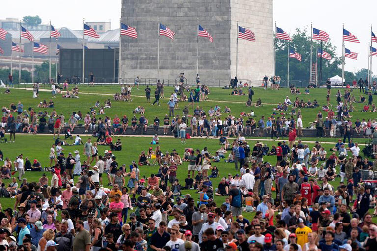 Trump blames weather forecasters for predicting rain amid poor parade ...